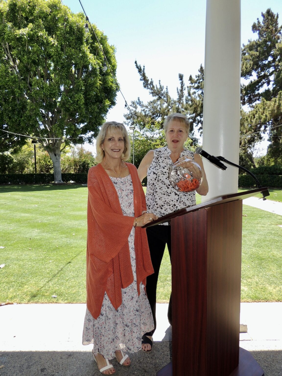 Cindy Gilbert RN prepares to help Jeri with the Raffle drawing ...