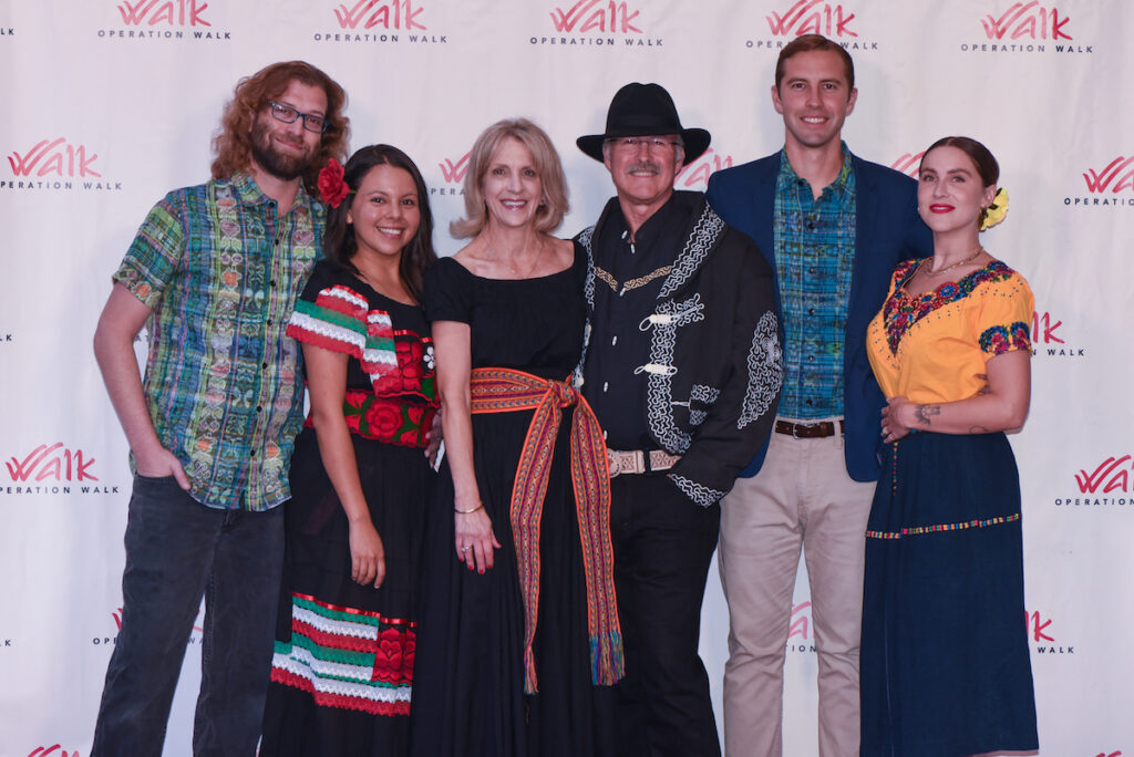Dr. Paul and Cindy Gilbert RN and family posing on the Red Carpet ...